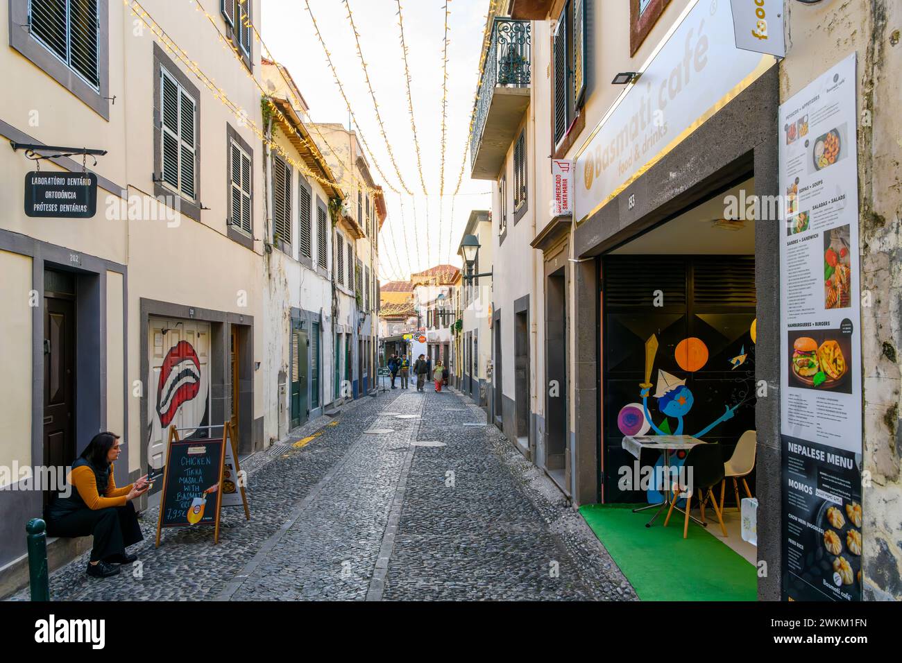 The famous Rua de Santa Maria narrow street of cafes, colorful doors ...