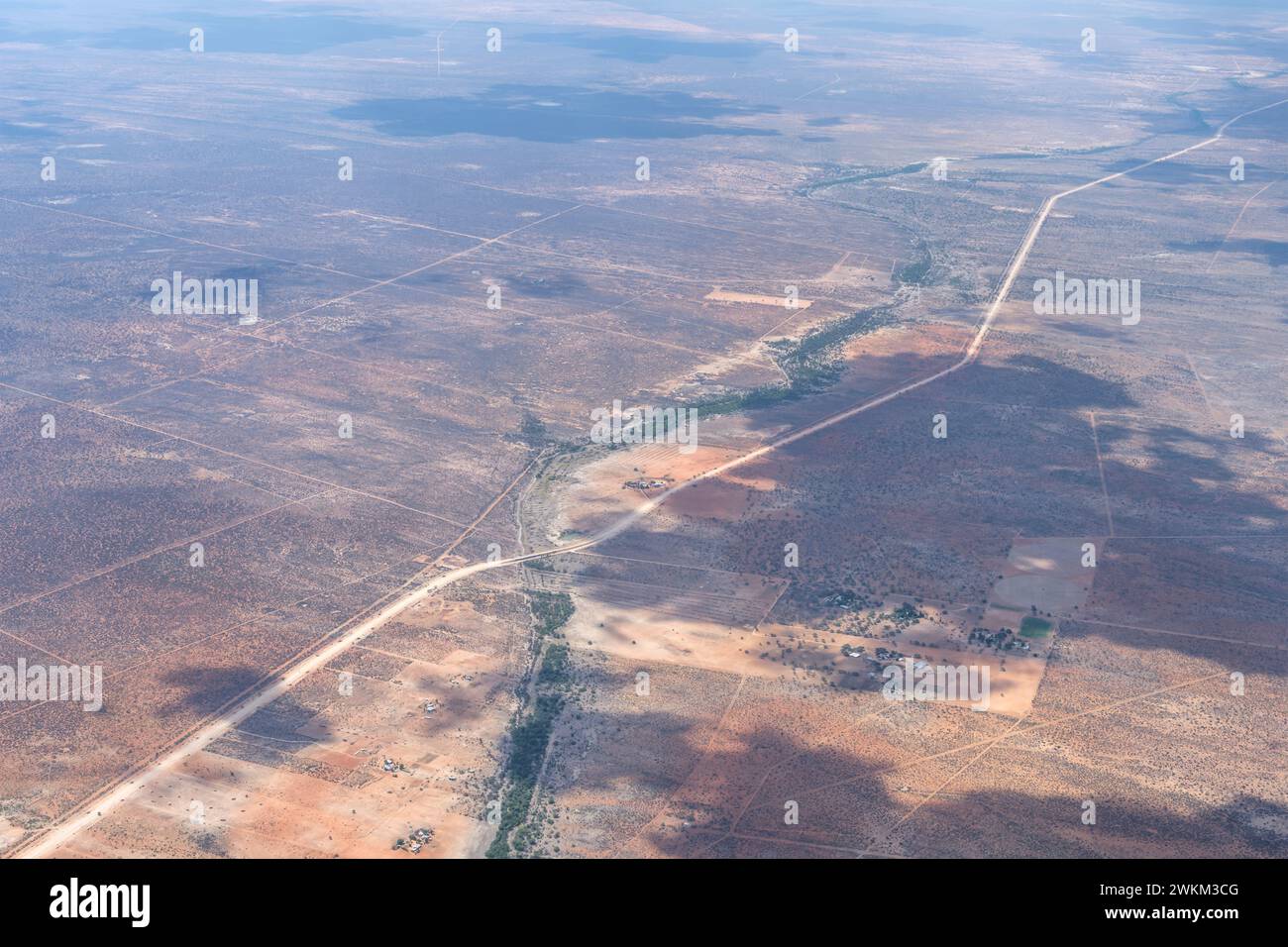aerial landscape with C30 road and Black Nossob river in desert, shot ...