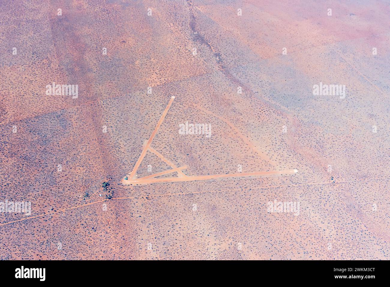 aerial landscape with airfield and lodge in Kalahari desert, shot from ...