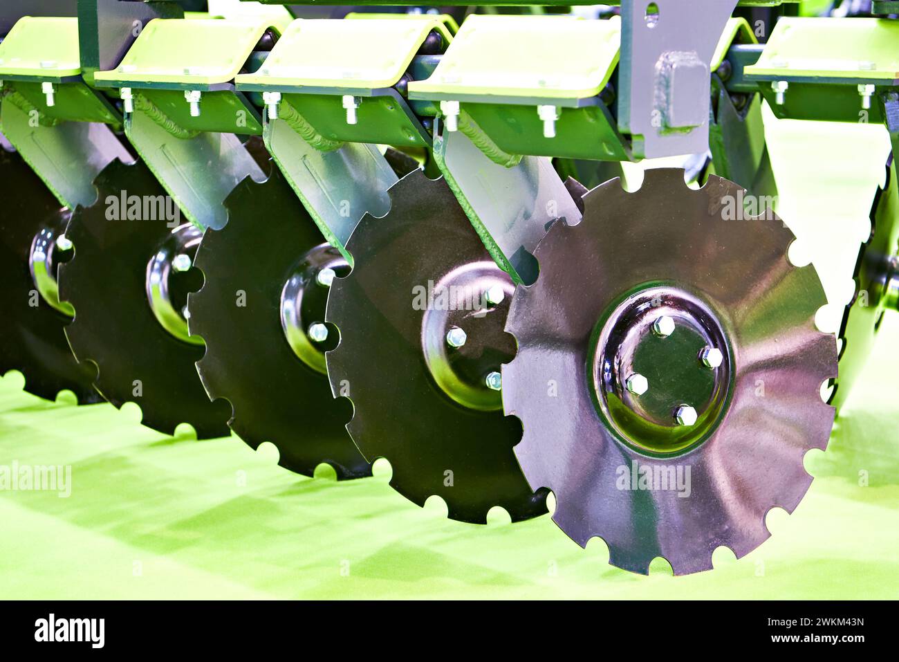 Trailed in-line disc harrow at an agricultural exhibition Stock Photo ...