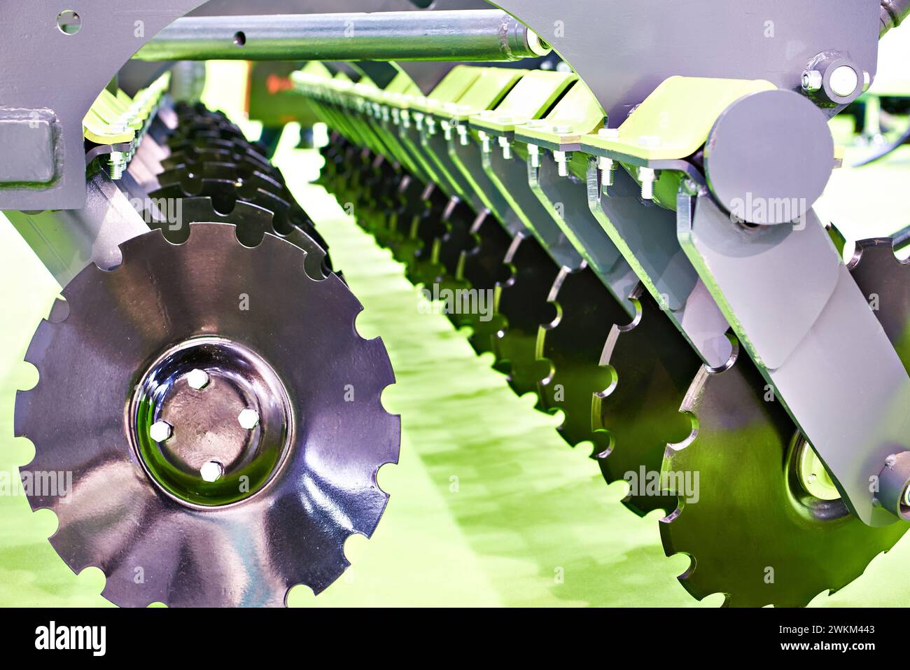 Trailed in-line disc harrow at an agricultural exhibition Stock Photo ...