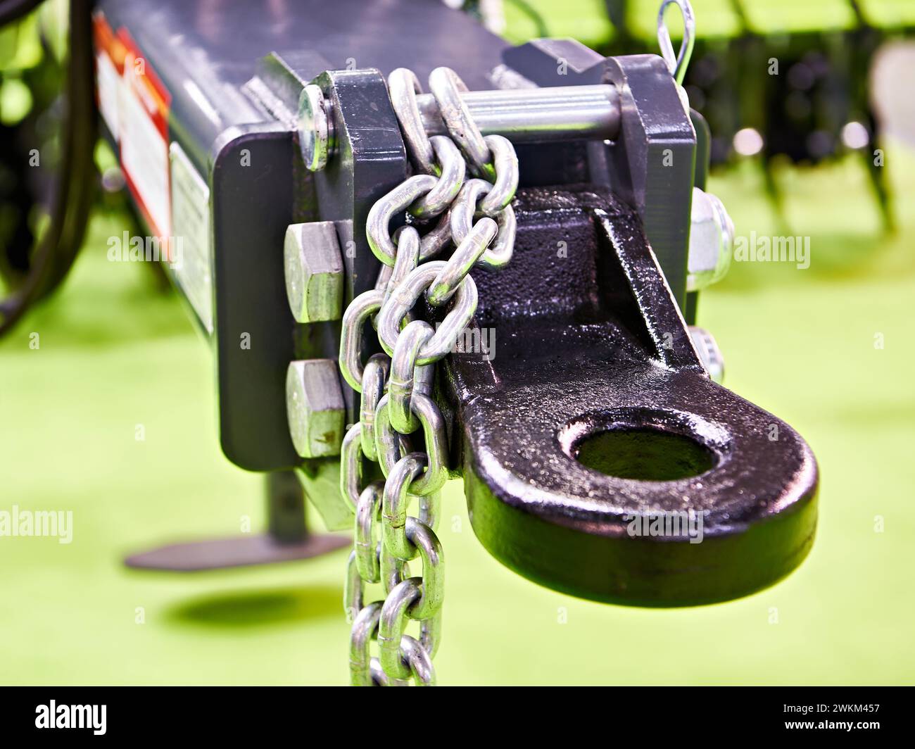 Metal chain and trailer drawbar closeup Stock Photo - Alamy