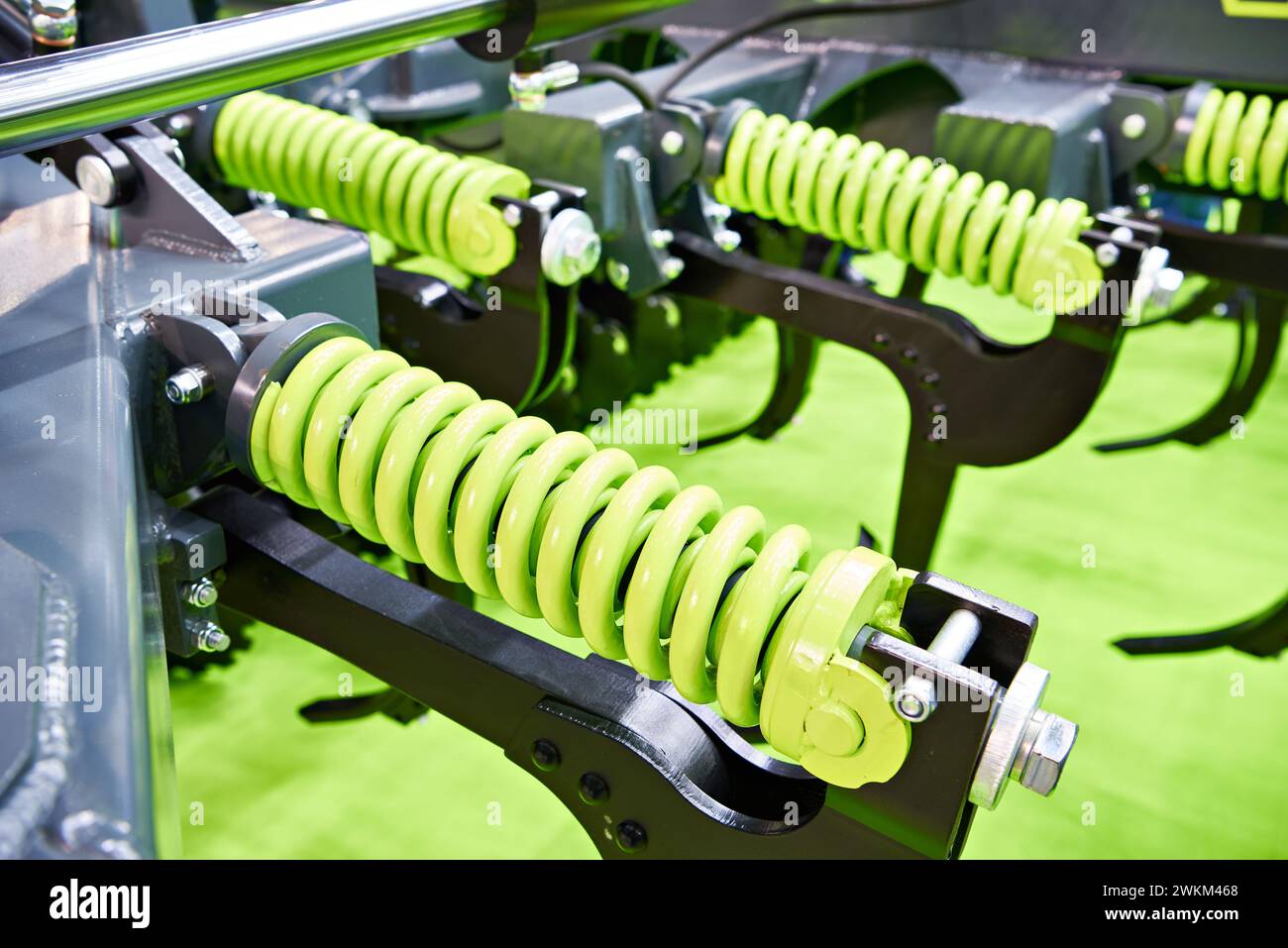 Strut springs of a universal cultivator at an agricultural show Stock ...