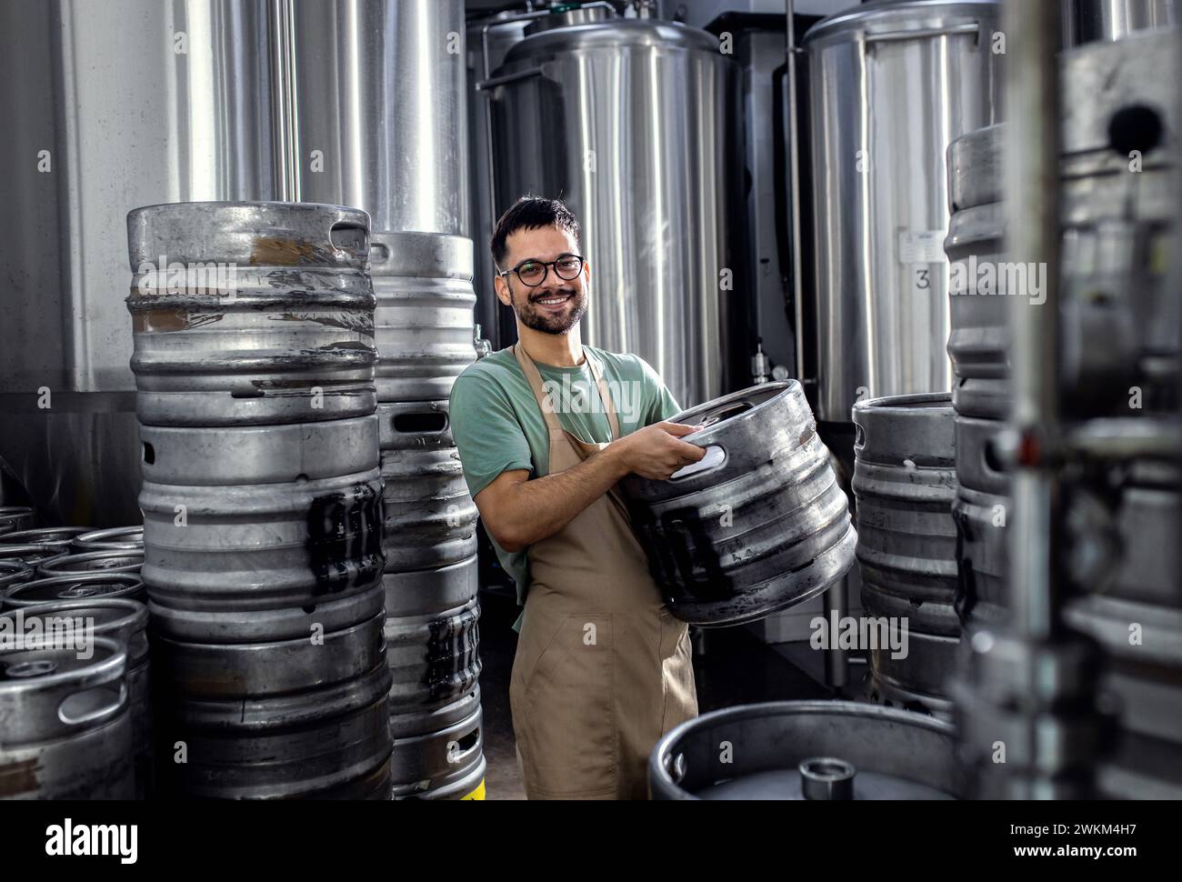 Man carrying beer barrel in hi-res stock photography and images - Alamy