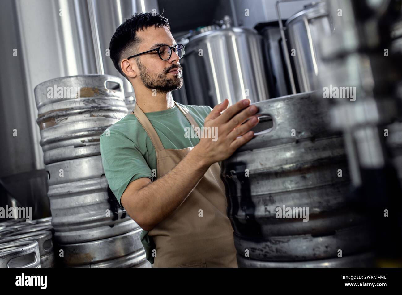 Man carrying beer barrel in hi-res stock photography and images - Alamy
