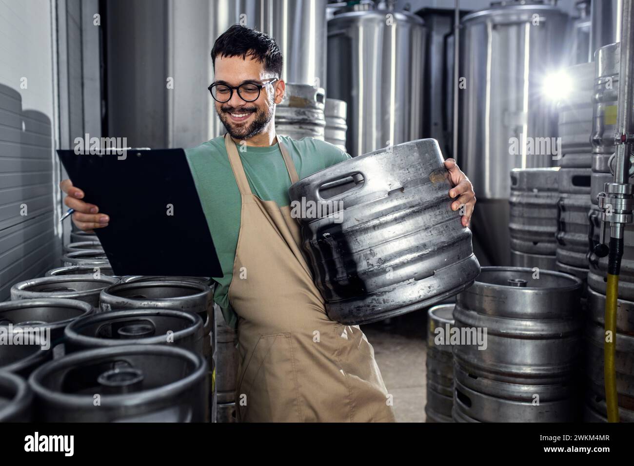 Man carrying beer barrel in hi-res stock photography and images - Alamy