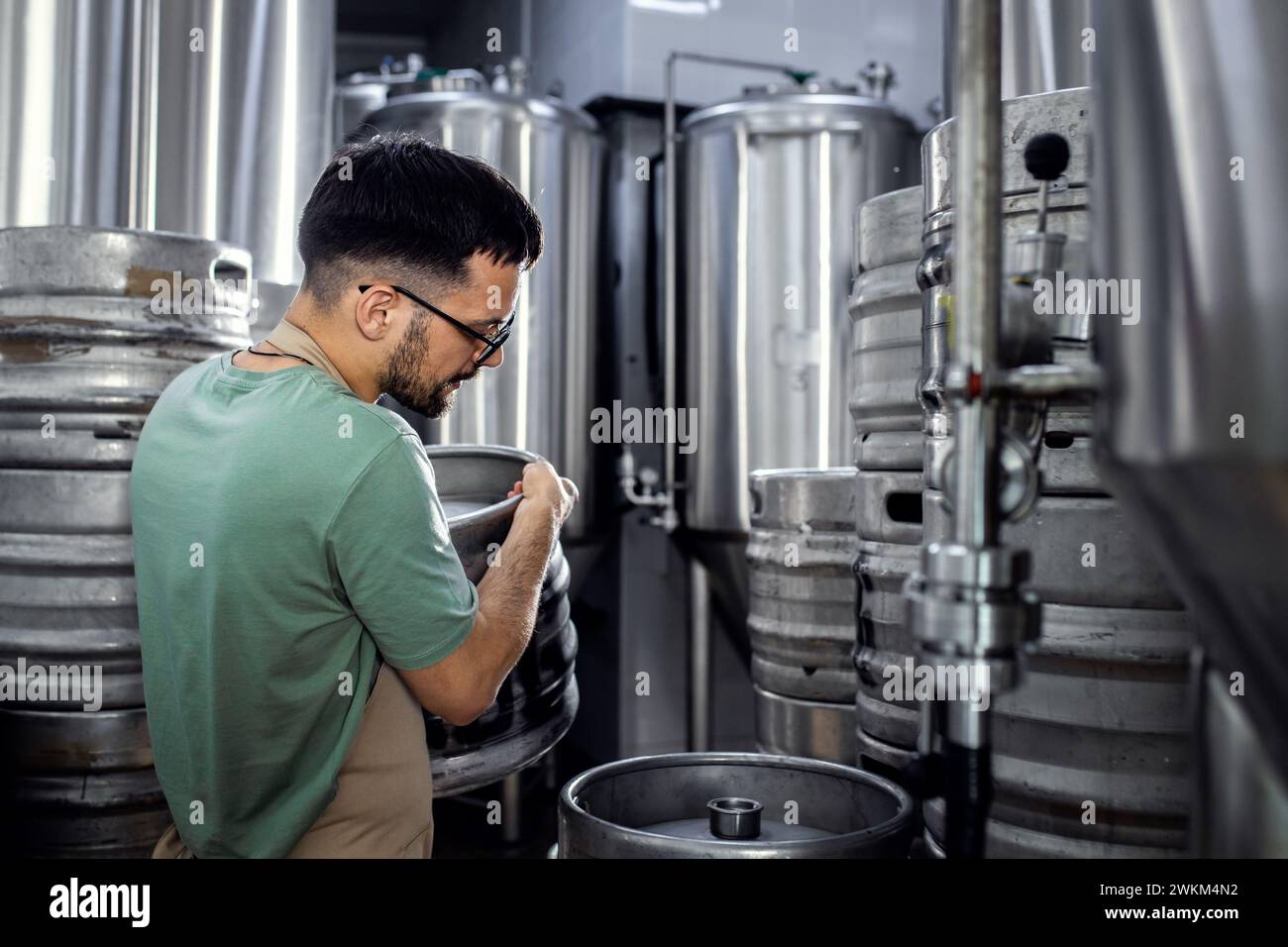 Man carrying beer barrel in hi-res stock photography and images - Alamy