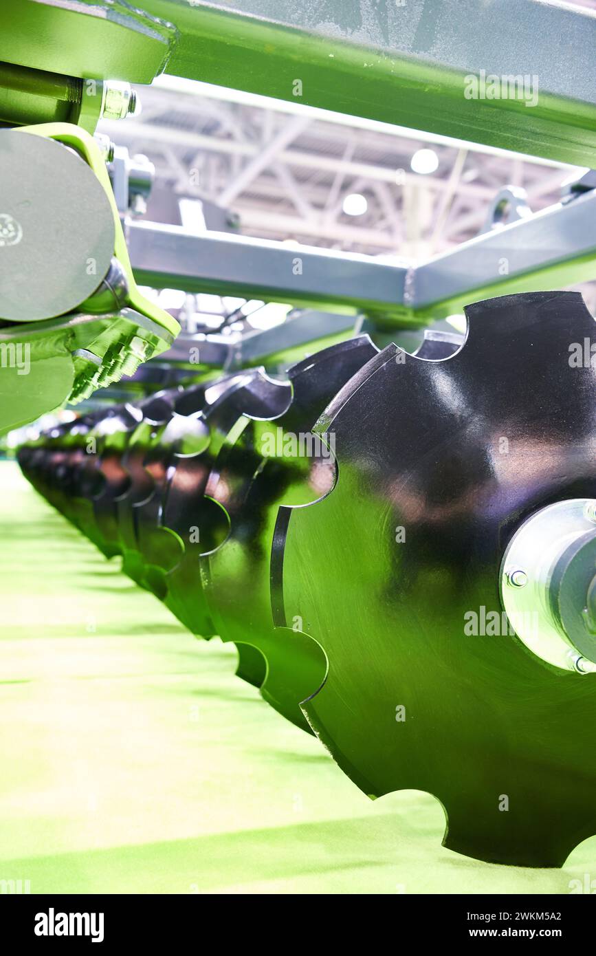 Trailed in-line disc harrow at an agricultural exhibition Stock Photo ...
