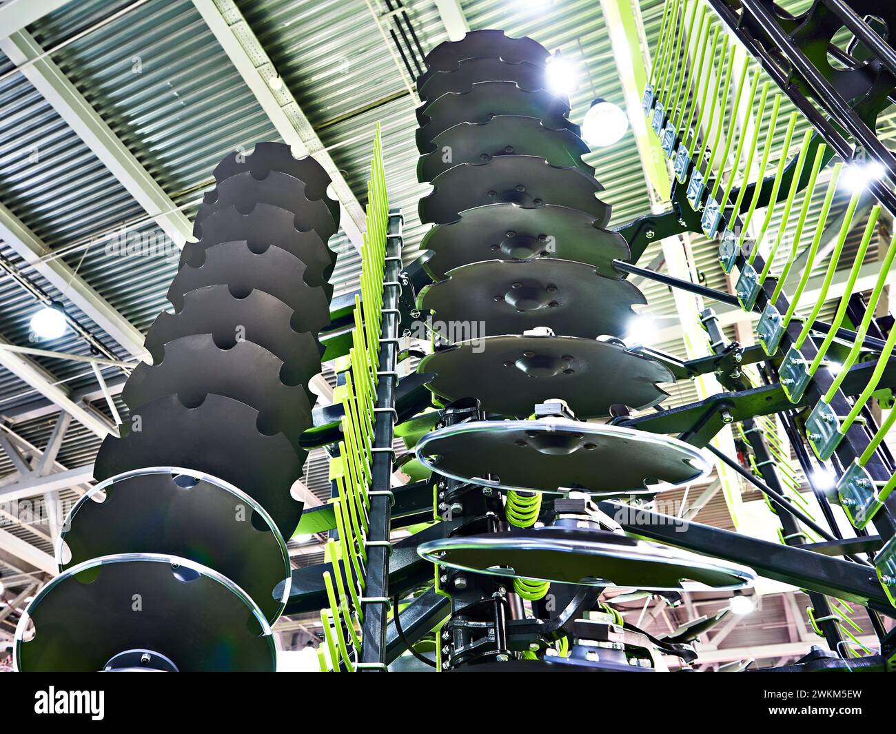 Disc harrow folded at an exhibition of agricultural machinery Stock ...