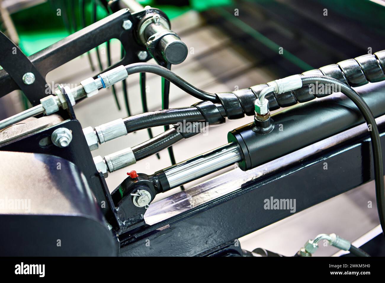Hydraulic hoses and cylinders of the machine mechanism Stock Photo - Alamy