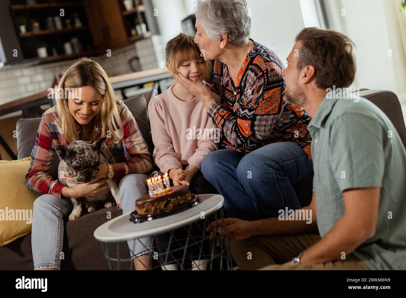 Heartwarming scene unfolds as a multi-generational family gathers on a ...