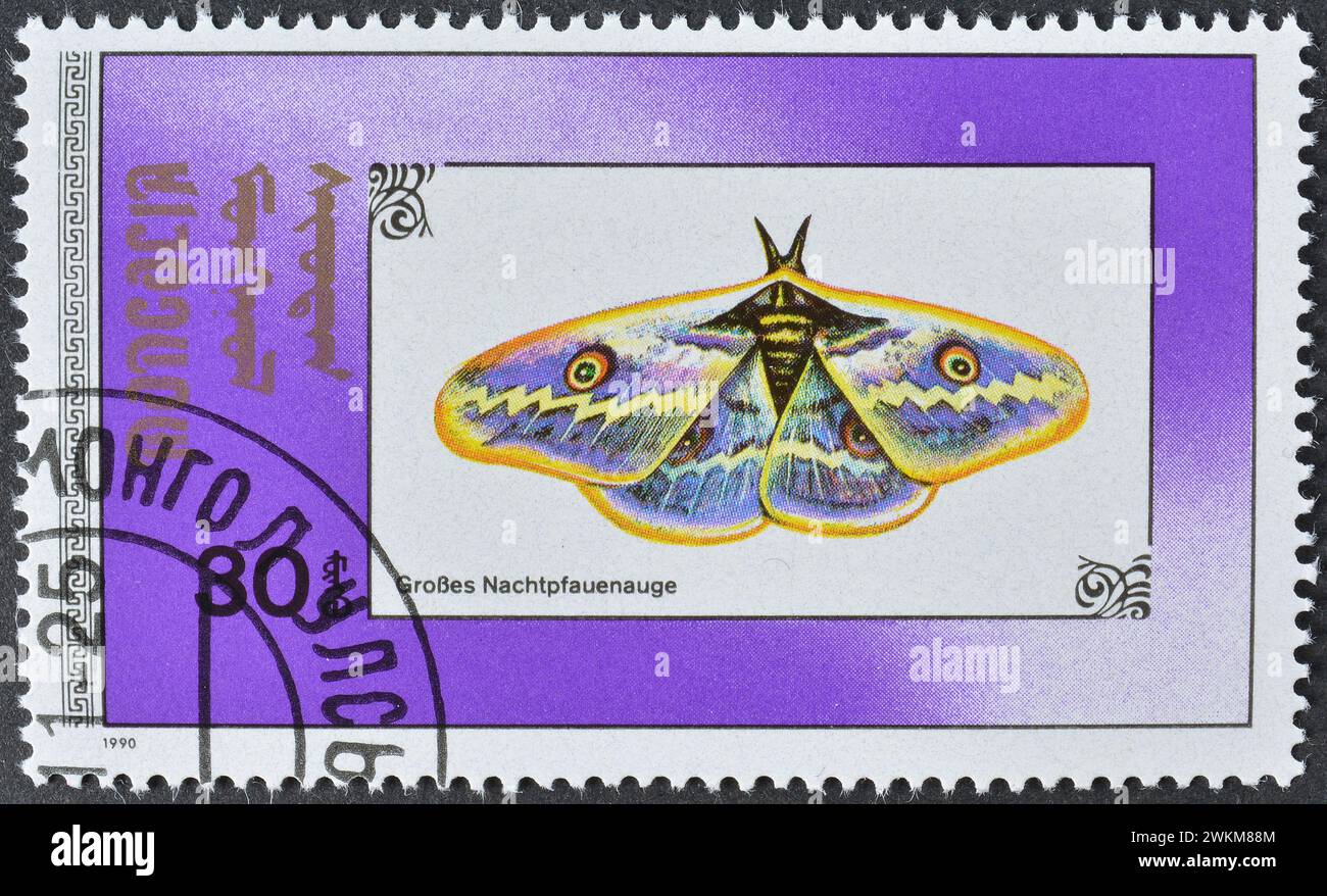 Cancelled postage stamp printed by Mongolia, that shows Large emperor ...