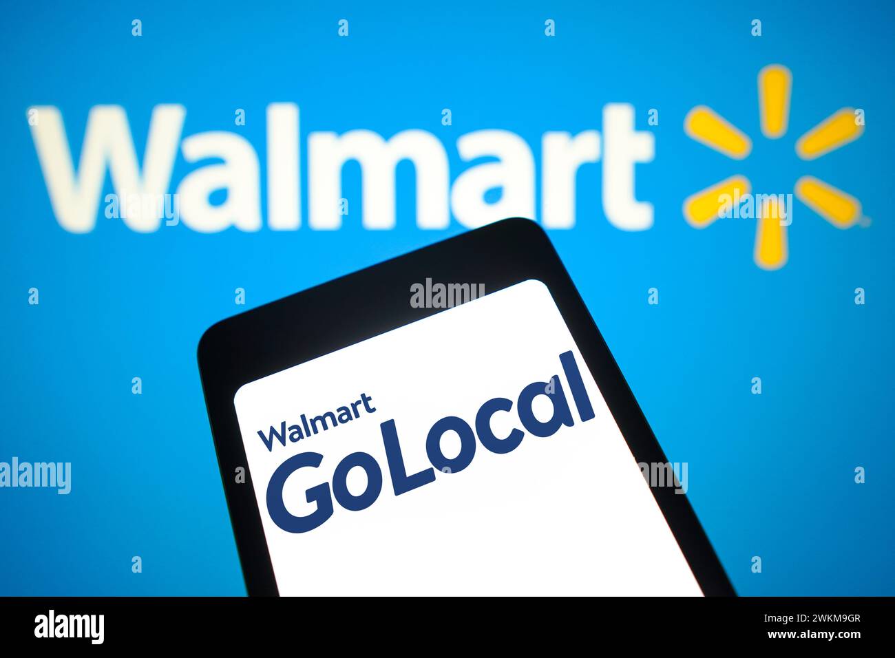 In this photo illustration, the Walmart GoLocal logo is displayed on a ...