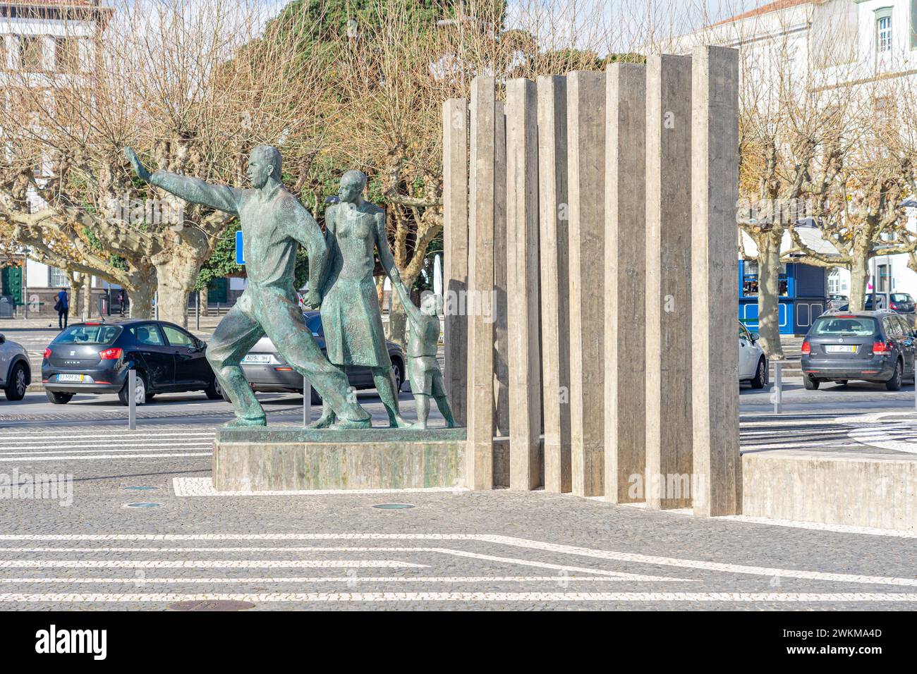 Monument in honor of the Azorean emigrant on an avenue in Ponta Delgada ...