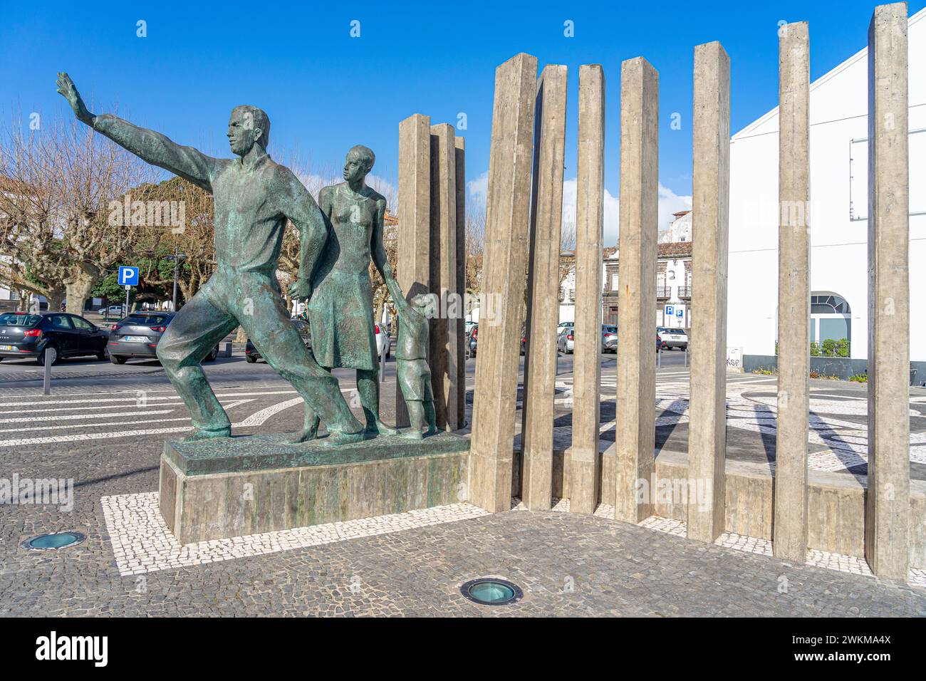Monument in honor of the Azorean emigrant on an avenue in Ponta Delgada ...
