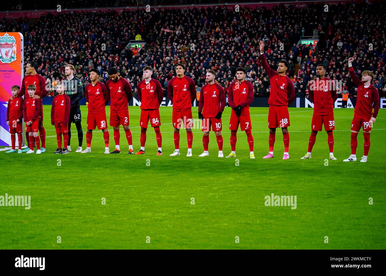 Liverpool players line up on the pitch ahead of the Premier League ...