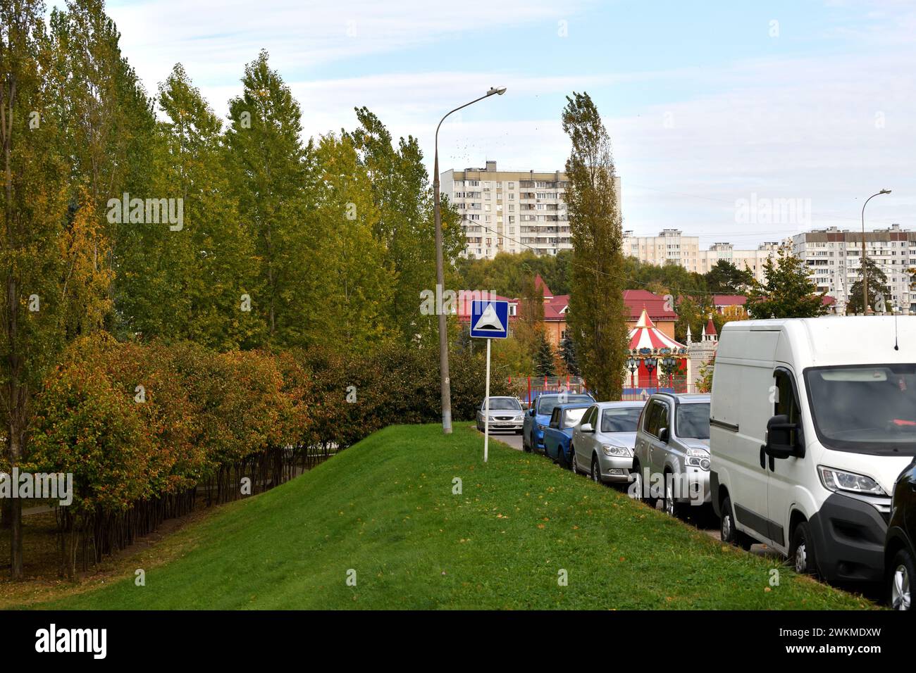 Moscow, Russia - 24 Sept 2023. Row of cars parked along sidewalk near ...