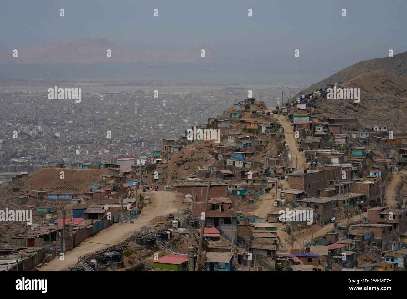 Homes fill the arid hilltop of Nuevo Paraiso on a hot summer day in ...