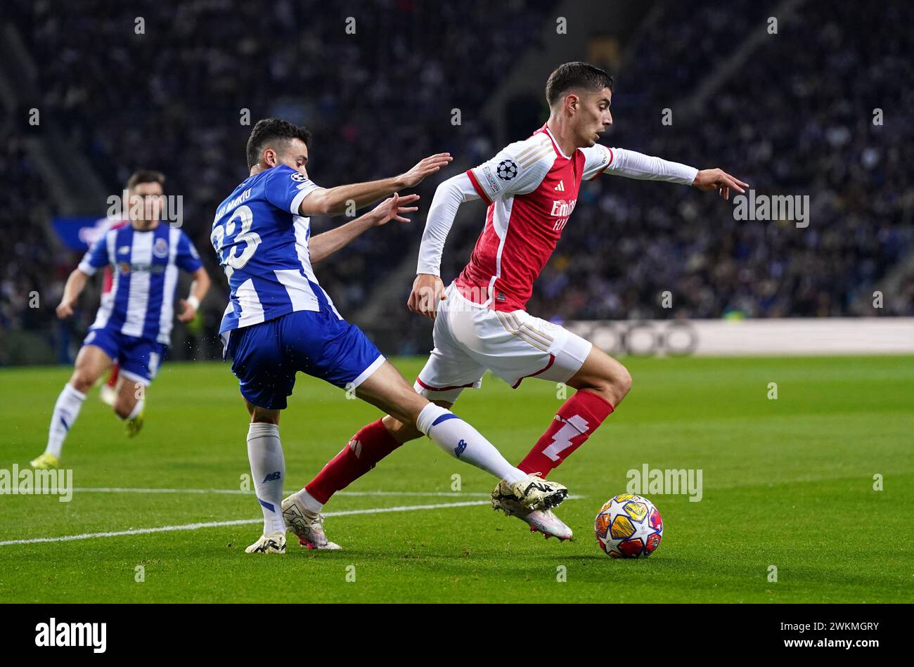 Porto's Joao Mario (left) and Arsenal's Kai Havertz battle for the ball ...