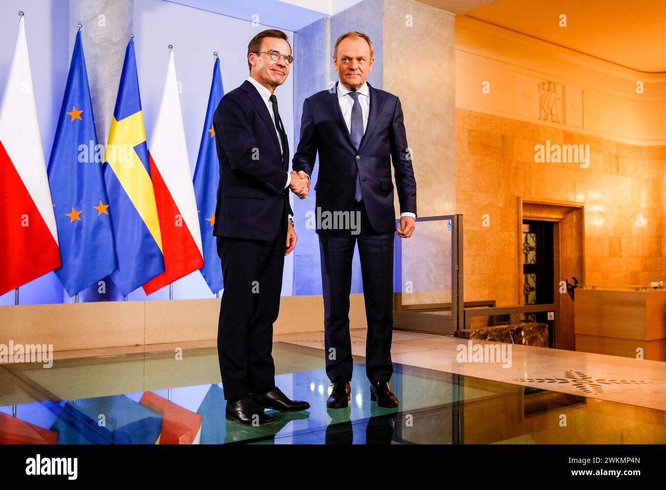 Warsaw, Poland. 19th Feb, 2024. Polish Prime Minister, Donald Tusk greets the Prime Minister of ...