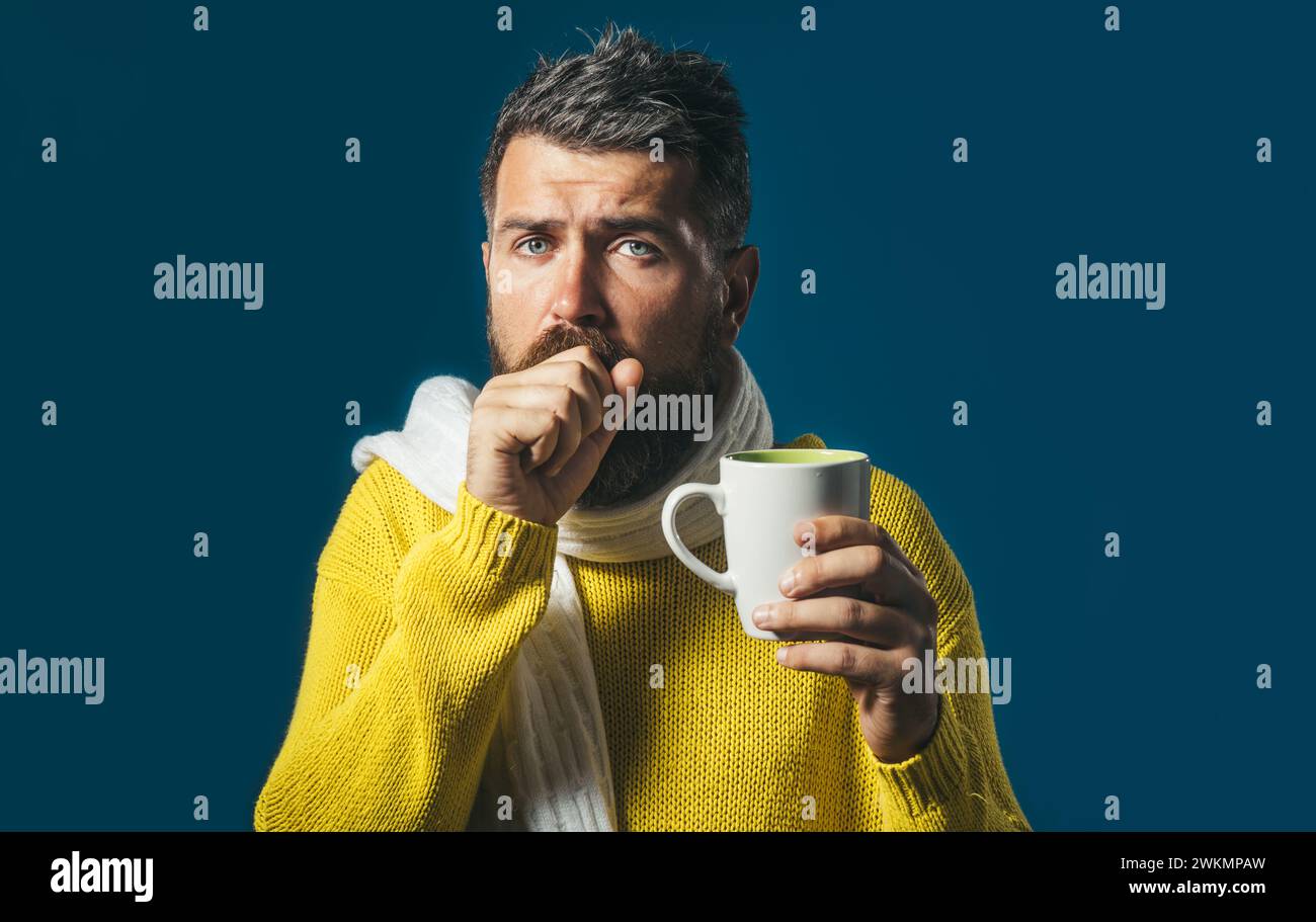 Man coughs. Sick male with cold or bronchitis coughing into his fist ...