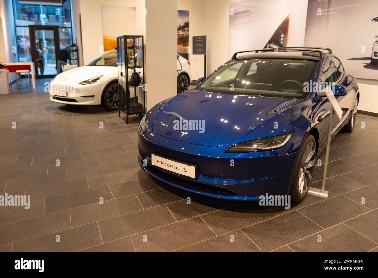 blue Tesla electric car model 3 in Studio, autopilot and eco-friendly ...