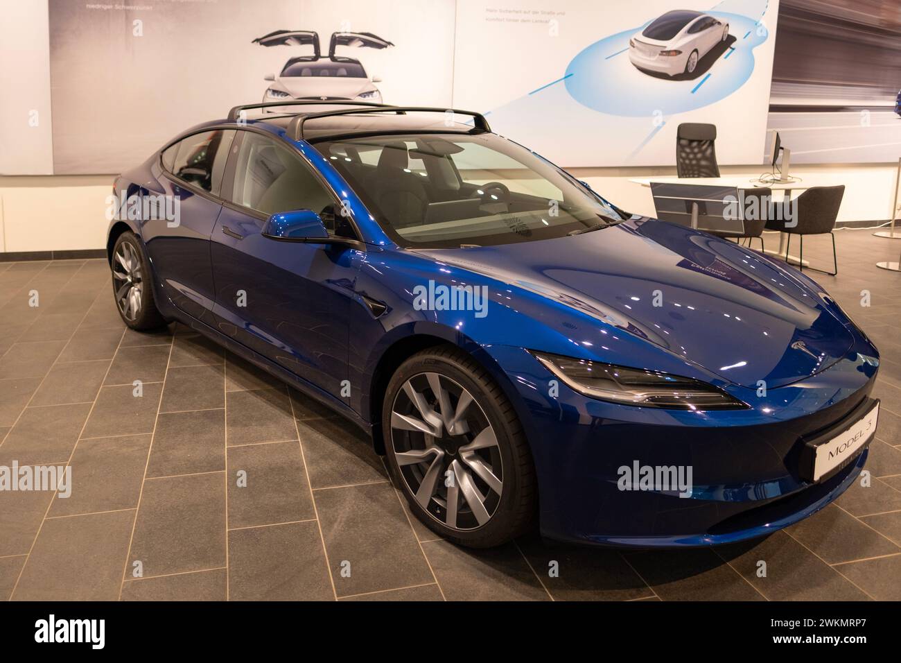 blue Tesla electric car model 3 in Studio, autopilot and eco-friendly ...