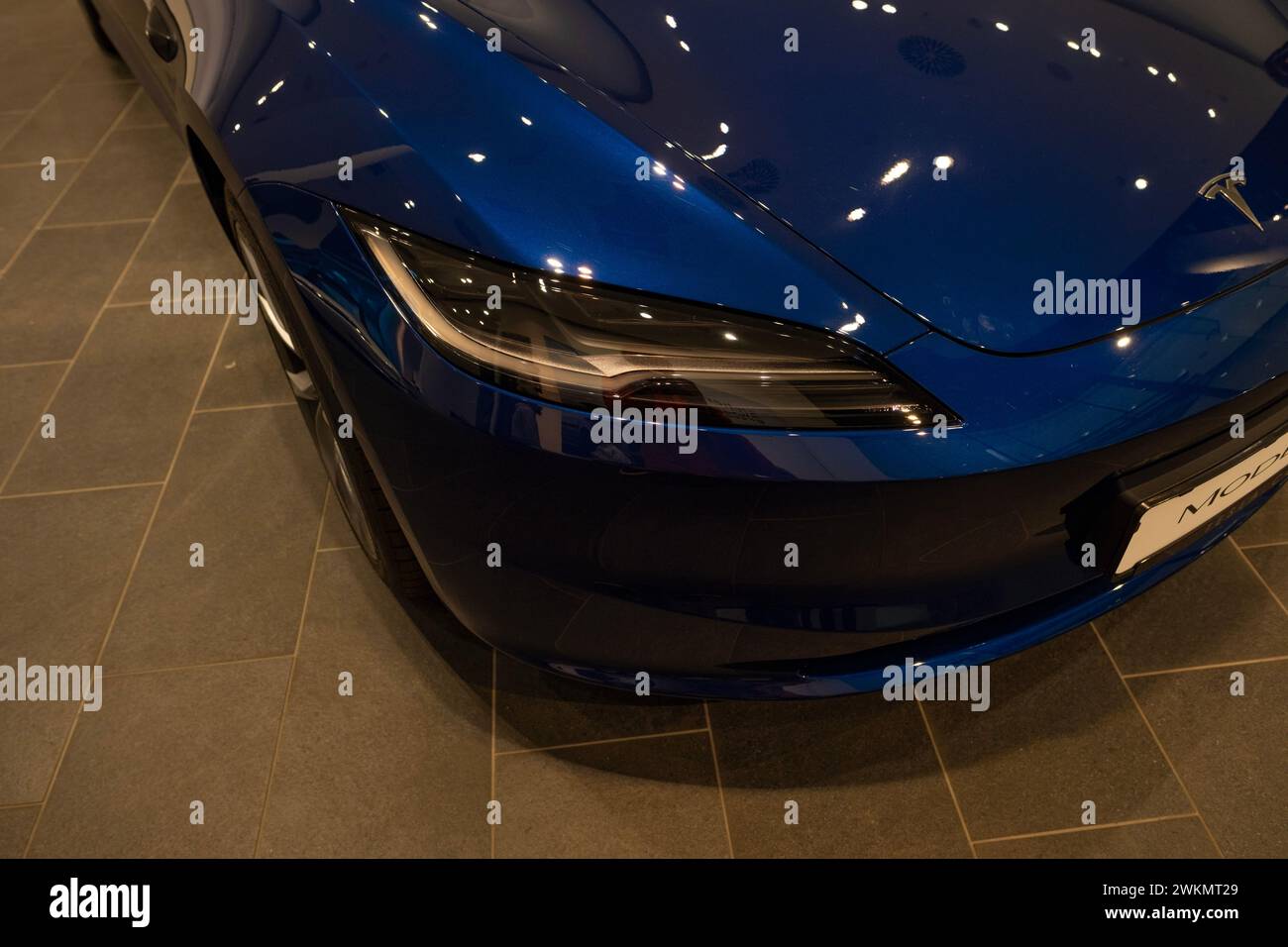 blue Tesla electric car model 3 in Studio, autopilot and eco-friendly ...