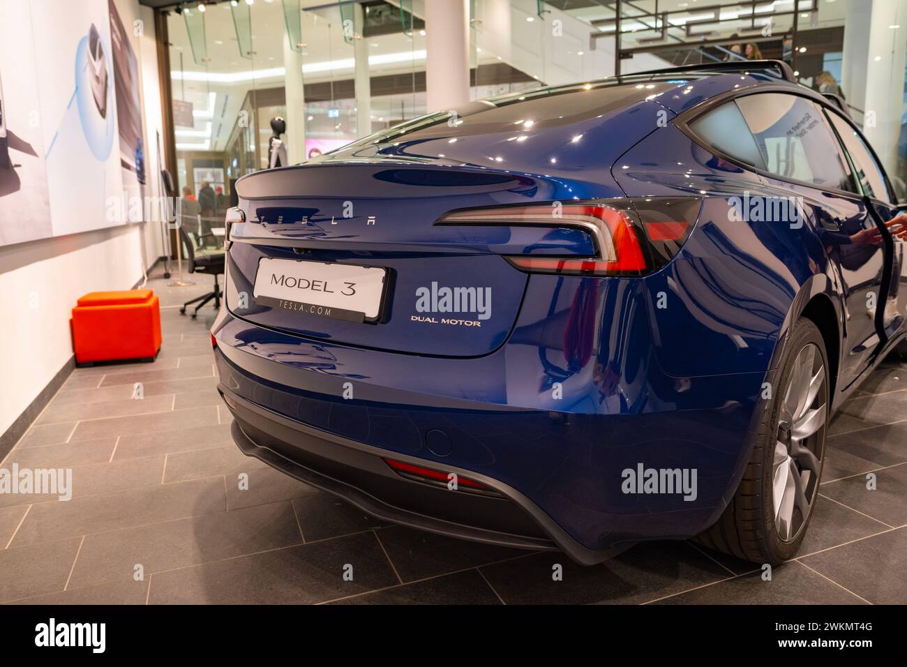 blue Tesla electric car model 3 in Studio, autopilot and eco-friendly ...