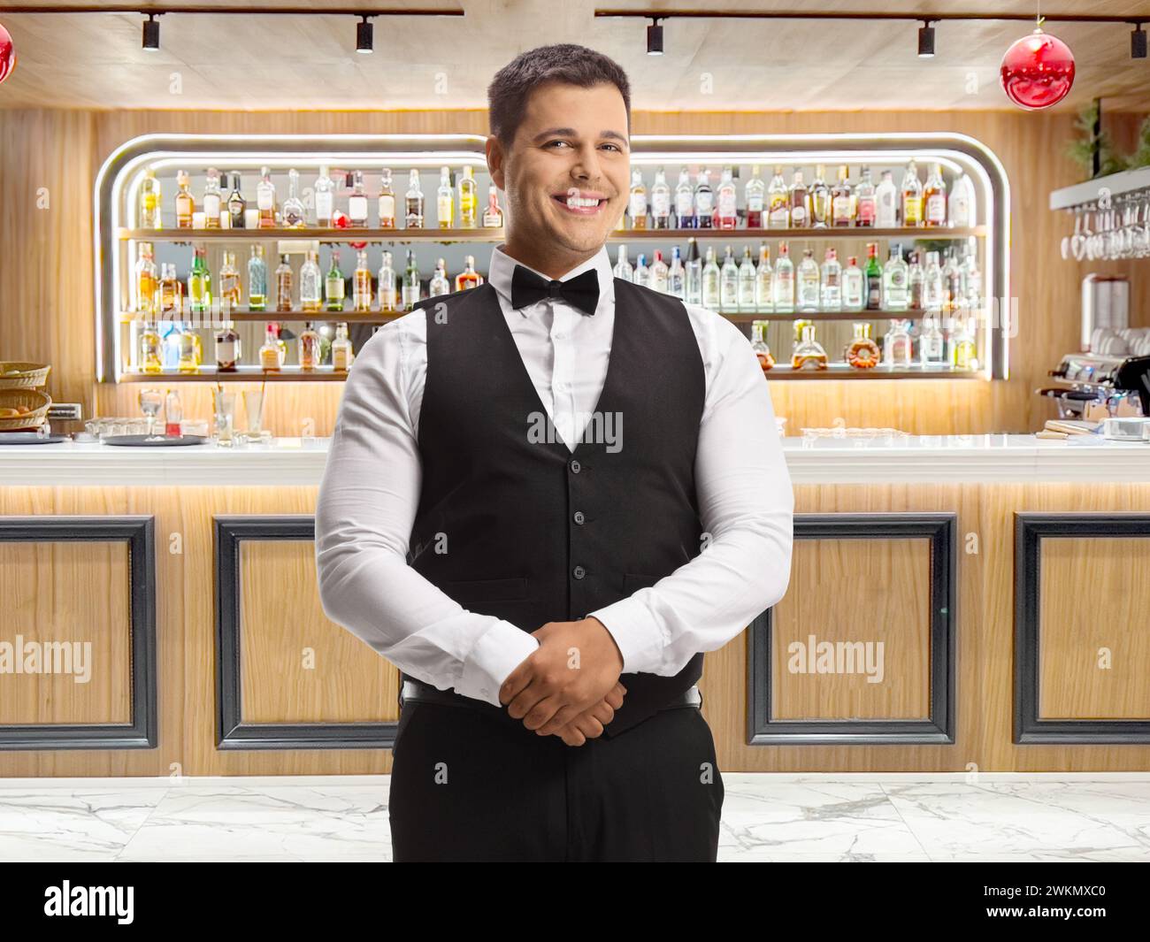 Hotel waiter hi-res stock photography and images - Alamy