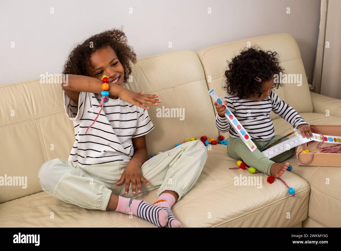 Two girls giggling hi-res stock photography and images - Alamy