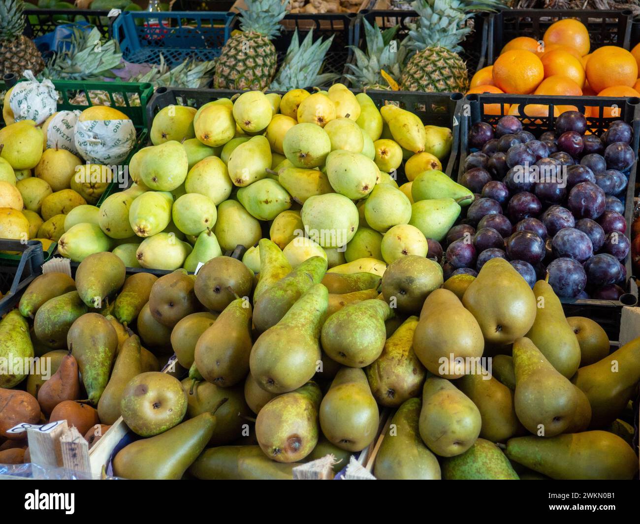 Fruits at the eastern market. Fruits in boxes for sale. The atmosphere ...
