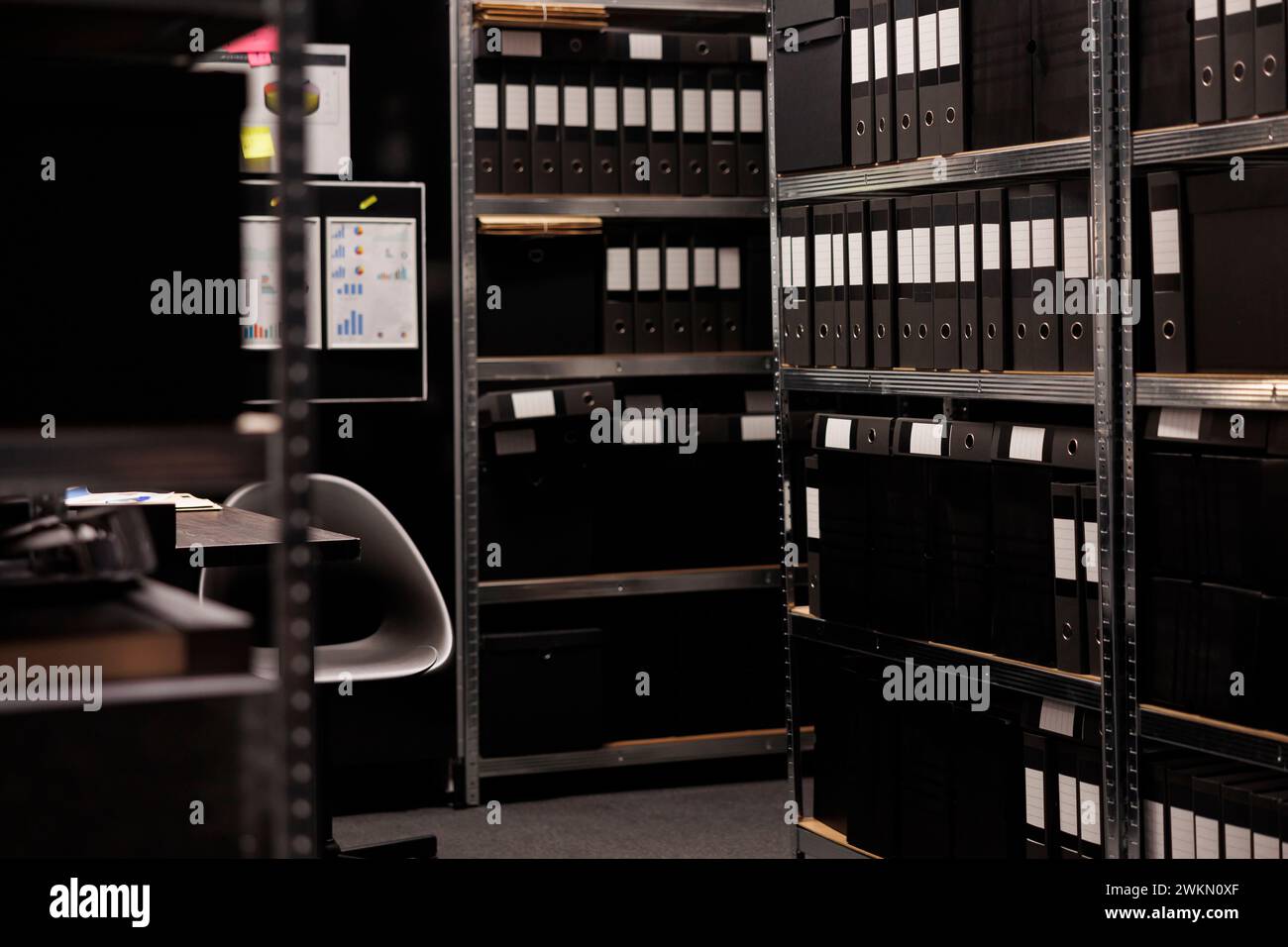 Empty detective space equipped with metallic storage full with criminal ...
