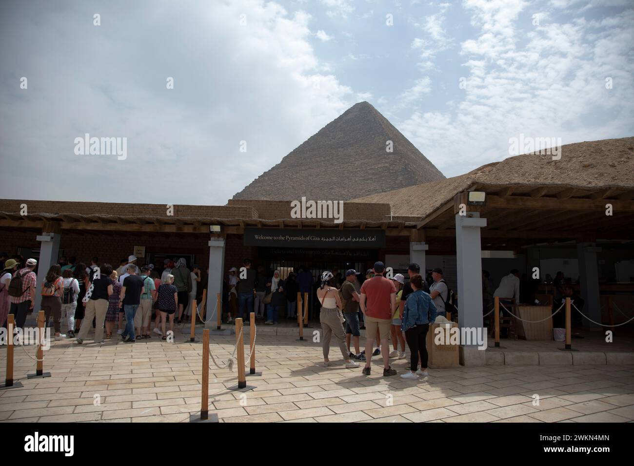 Cairo, Egypt. 24th Mar, 2023. Awaiting Adventure: Tourists line up for ...
