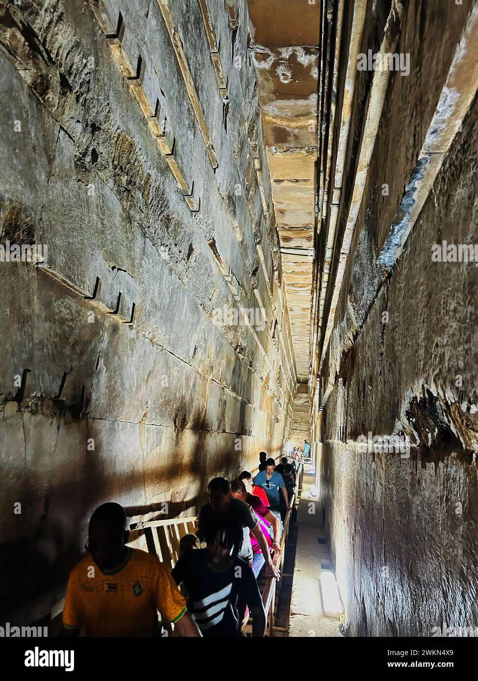 Cairo, Egypt. 24th Mar, 2023. Tourists delve deep inside the Great ...