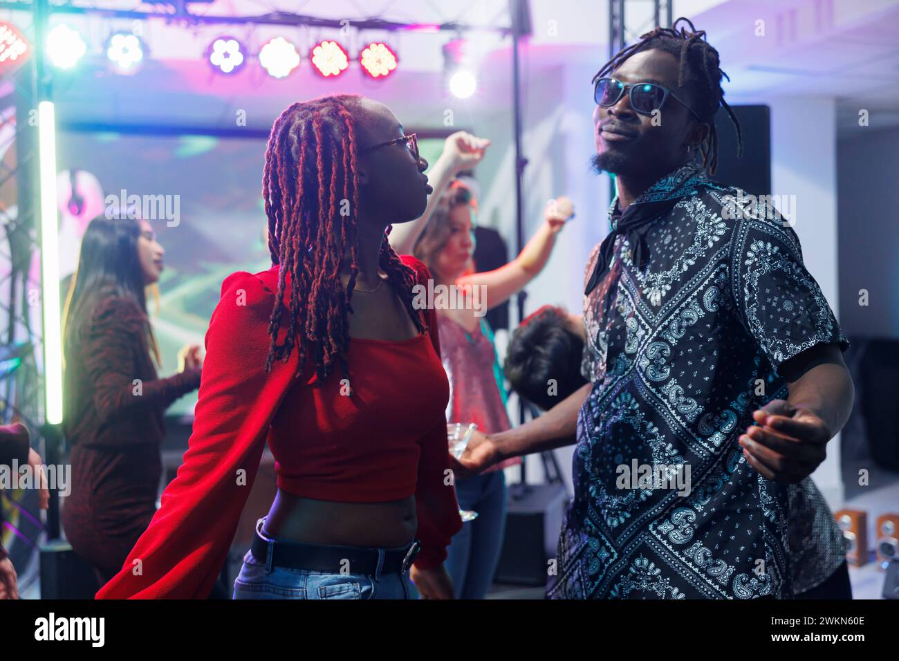 Relaxed african american man and woman dancers partying on nightclub ...