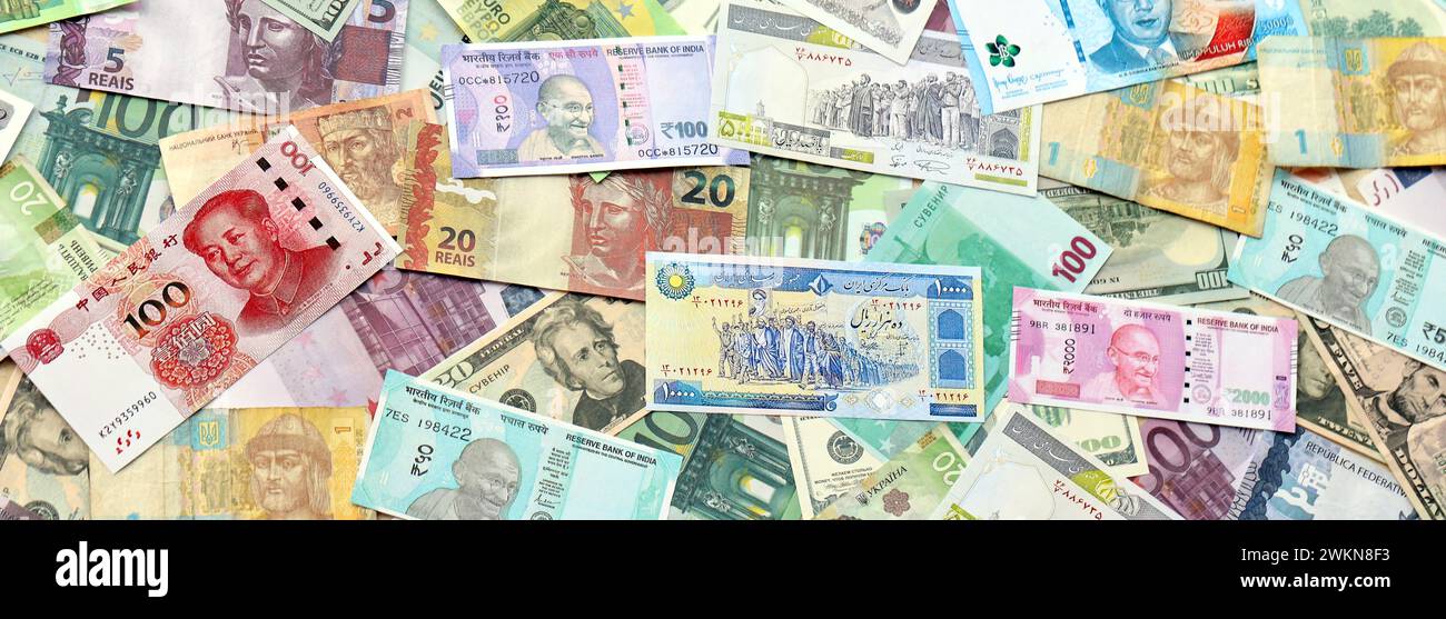 Many banknotes of different currency. Background of big amount of ...