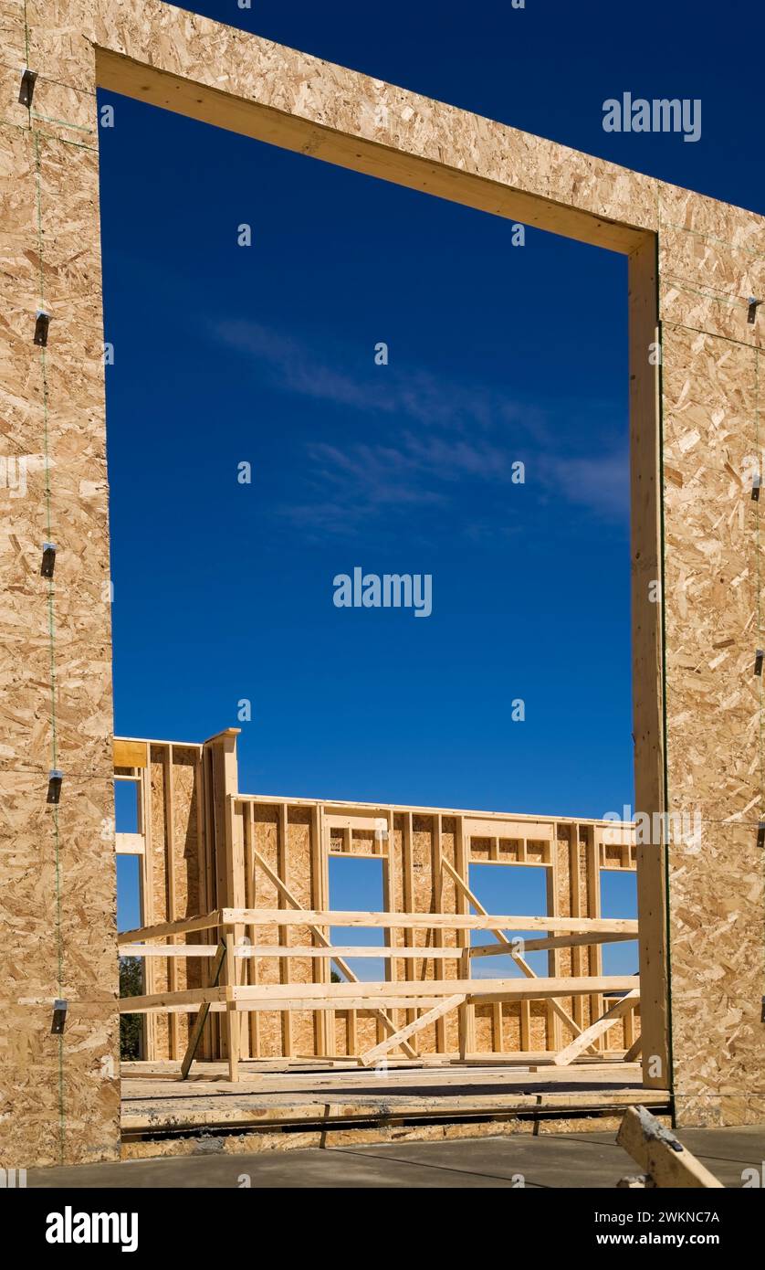 Exterior and interior wood frame walls of home under construction Stock ...