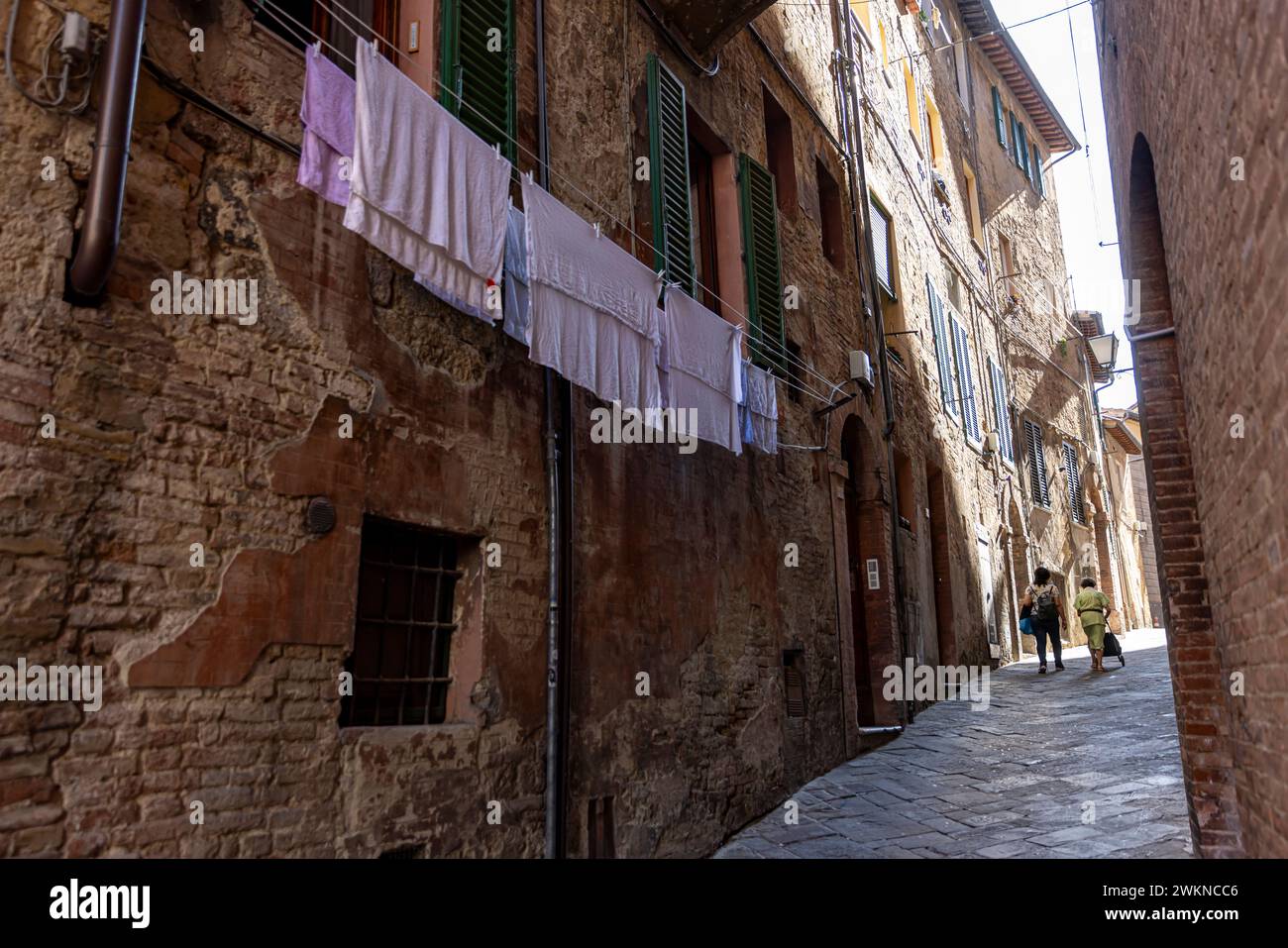 Daily life in Siena Italy Stock Photo - Alamy