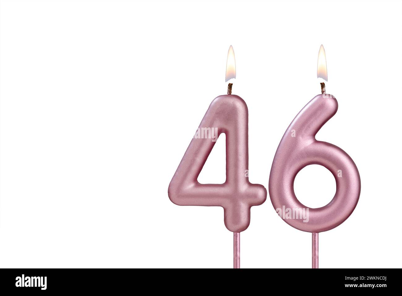 Lit birthday candle - Candle number 46 on white background Stock Photo ...