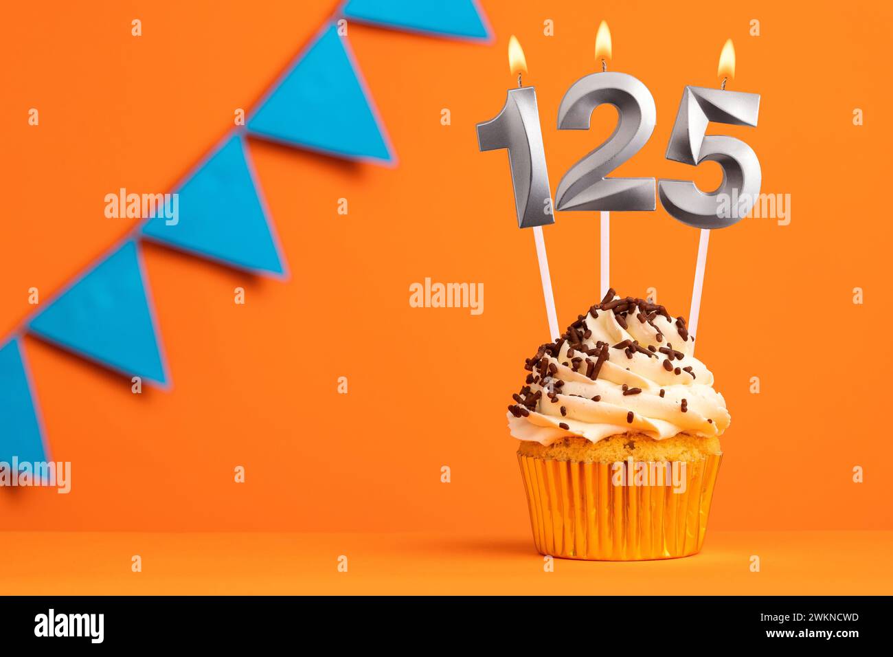 Candle number 125 - Cupcake birthday in orange background Stock Photo ...