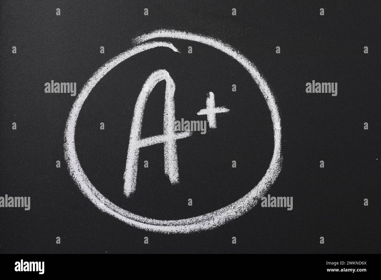 School grade. Letter A with plus symbol on blackboard, closeup Stock ...