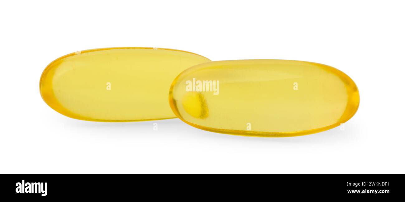 Yellow vitamin capsules isolated on white. Health supplements Stock ...