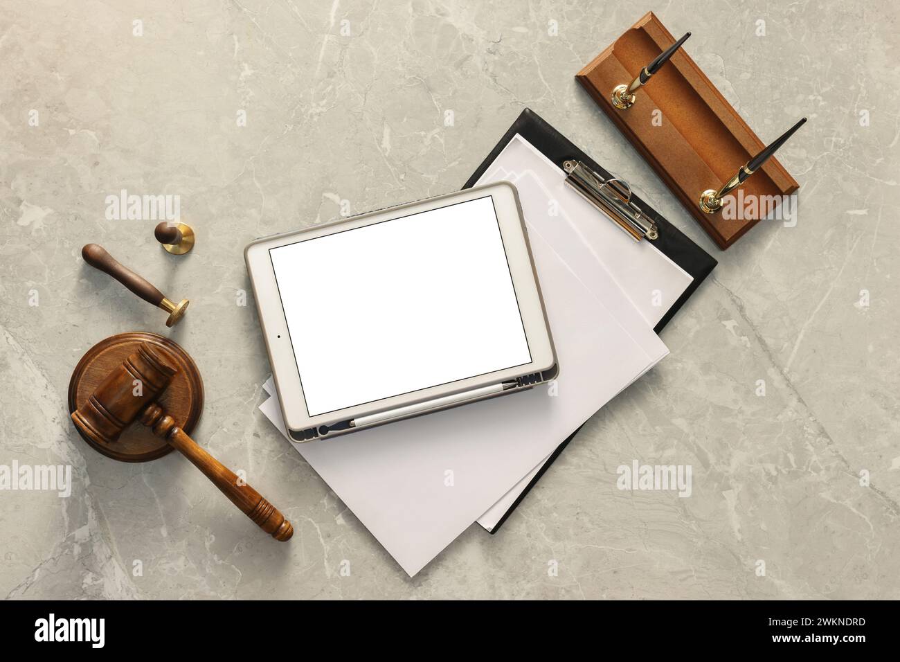 Flat lay composition with modern tablet on gray marble table. Space for ...