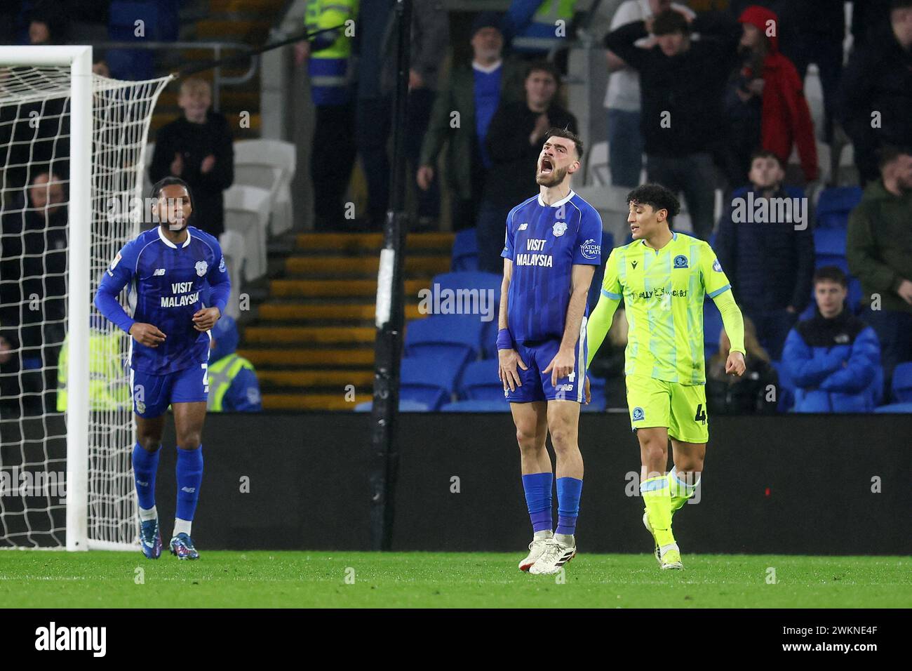 Cardiff, UK. 20th Feb, 2024. Dimitris Goutas of Cardiff City (4) reacts ...