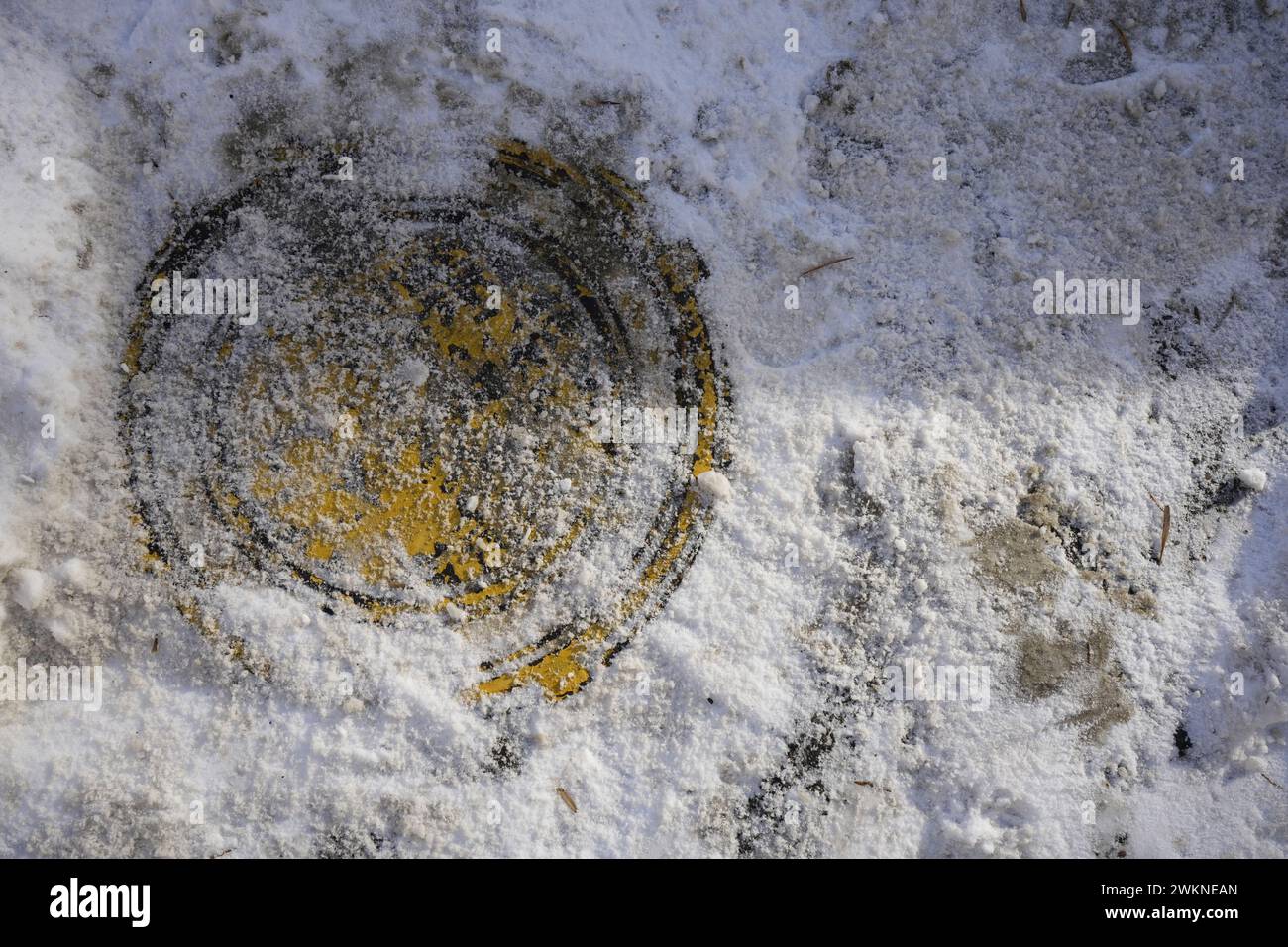 Sewer hatch covered with snow outdoors, top view Stock Photo - Alamy