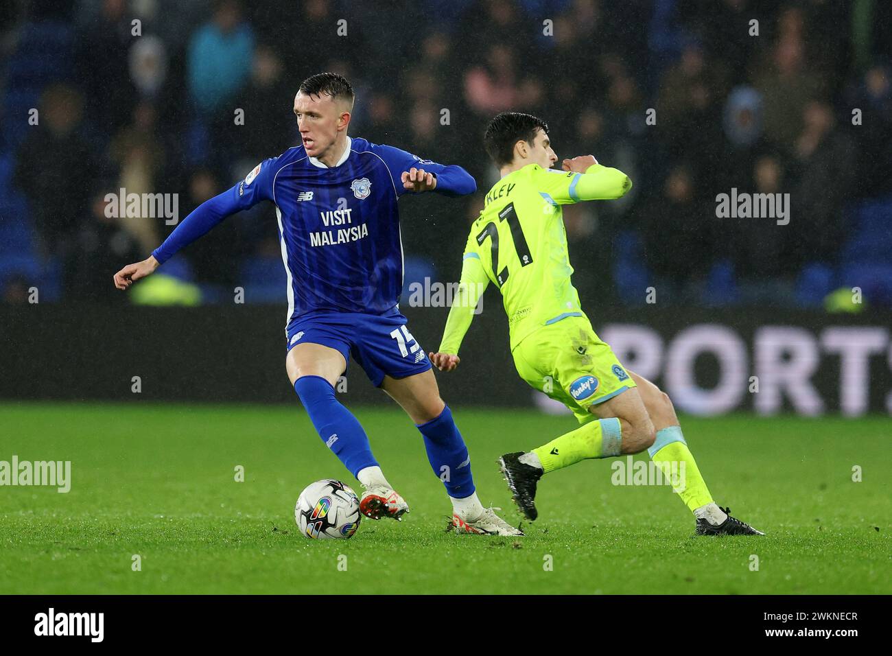 Cardiff, UK. 20th Feb, 2024. David Turnbull of Cardiff City (l) in ...