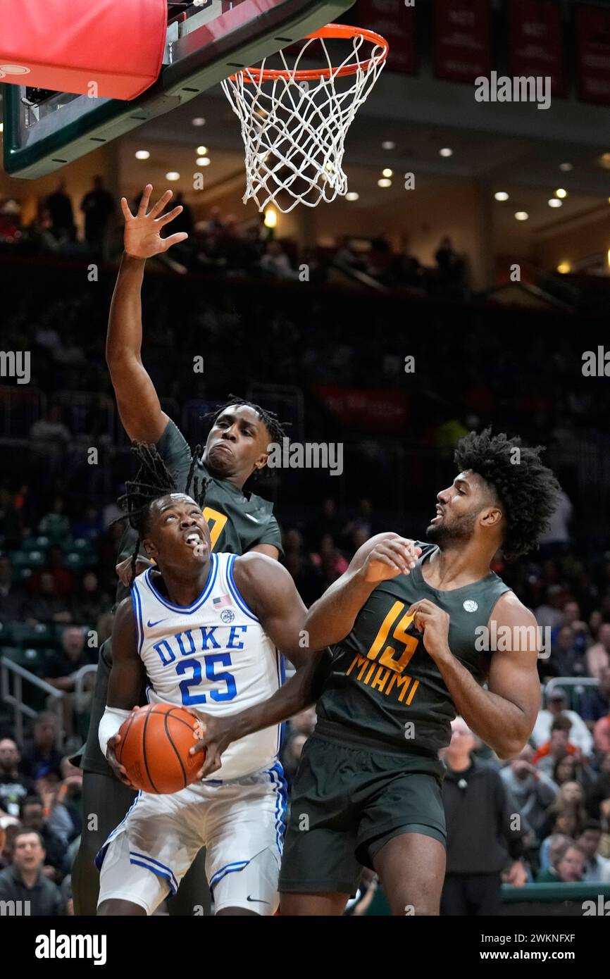 Duke forward Mark Mitchell (25) goes up for a shot against Miami ...