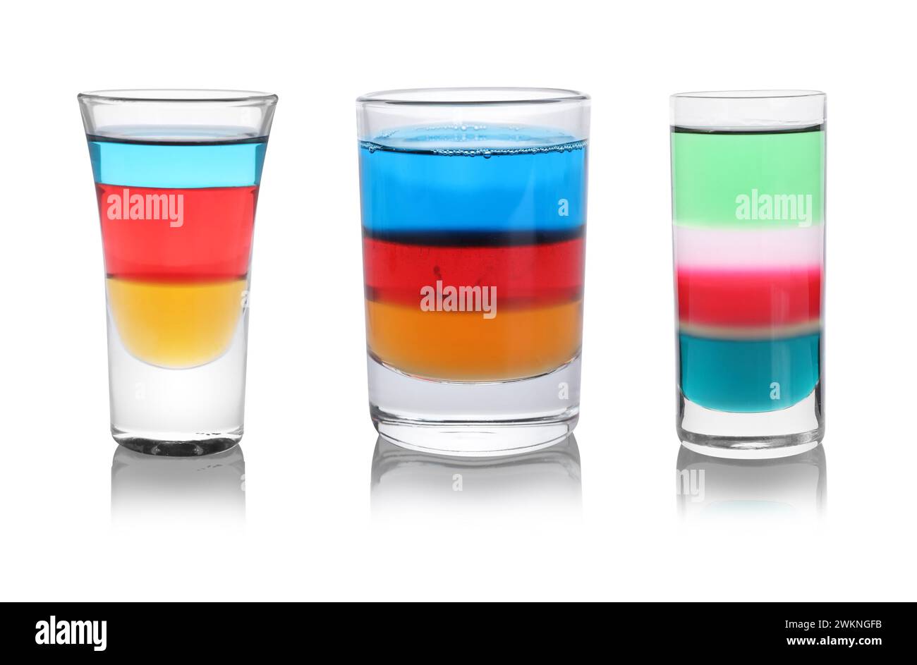 Different shooters in shot glasses isolated on white, set Stock Photo ...