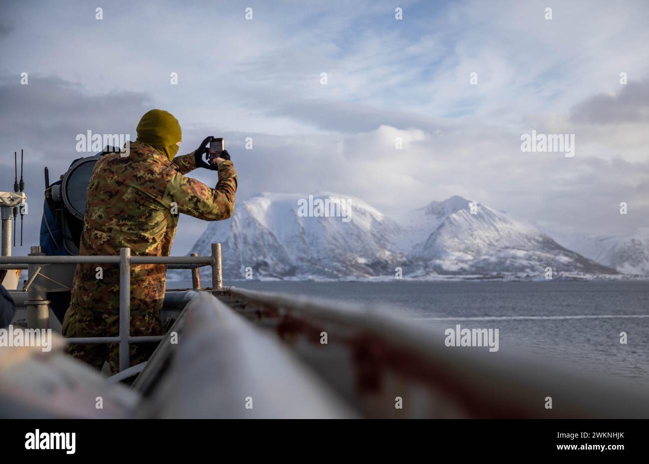 Harstad, Norway. 21st Feb, 2024. An Italian sailor takes a photo of the ...
